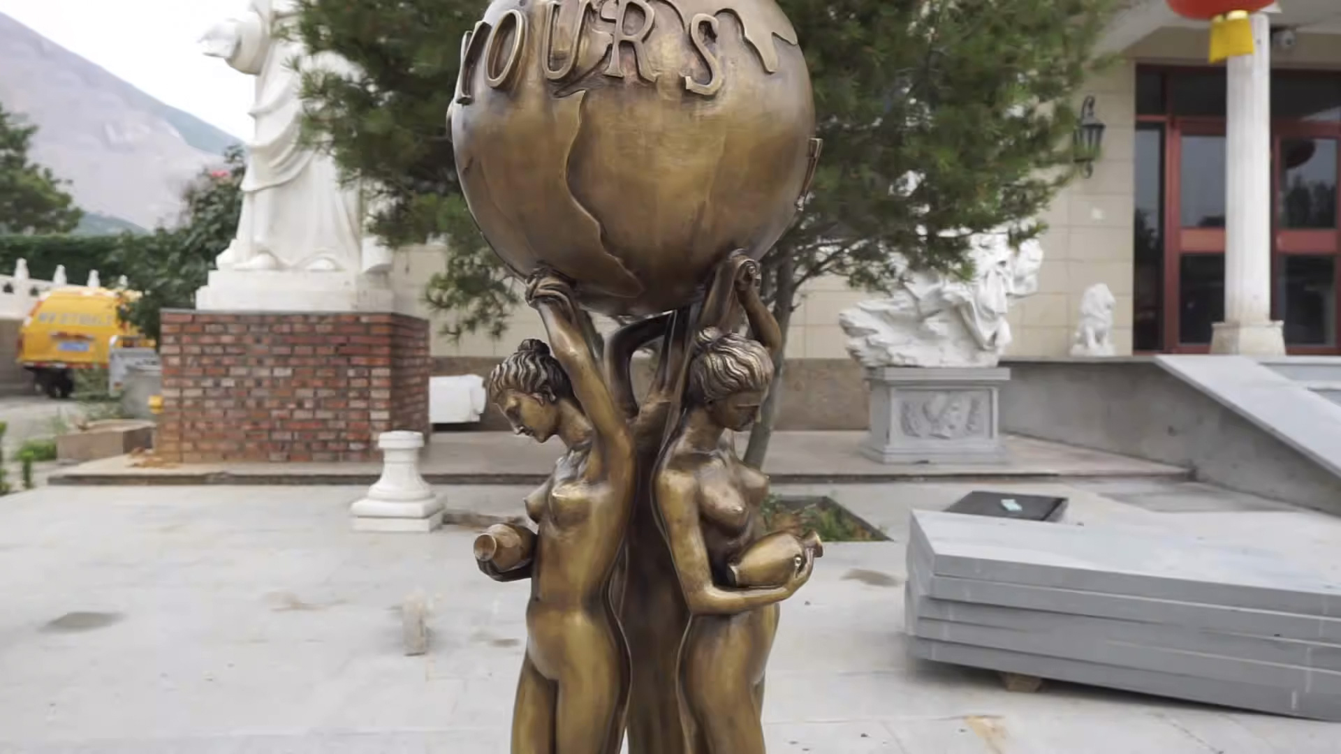 the world is yours globe statue - arthimoth